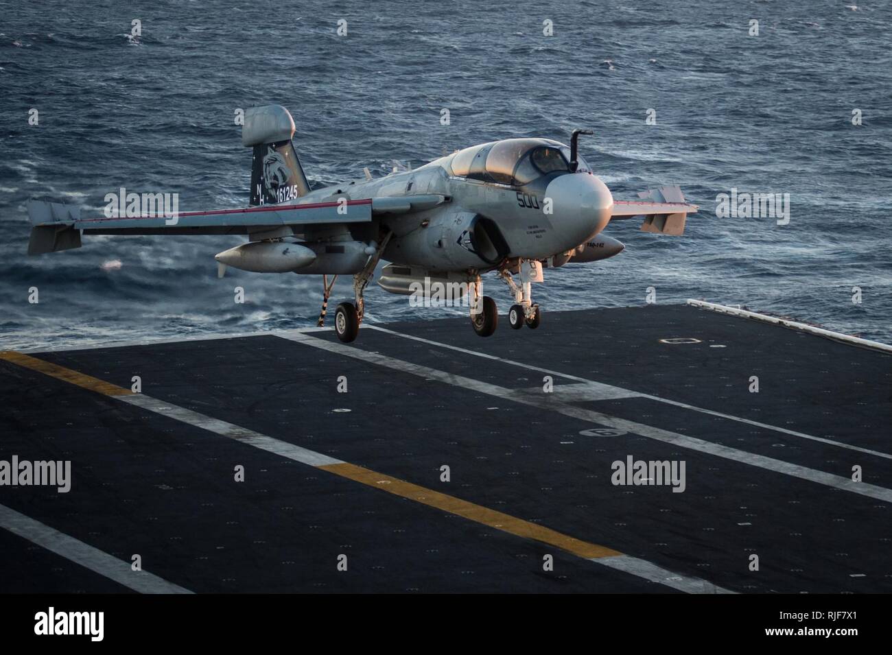 An EA-6B Prowler lands aboard USS Nimitz. (8138416327 Stock Photo - Alamy