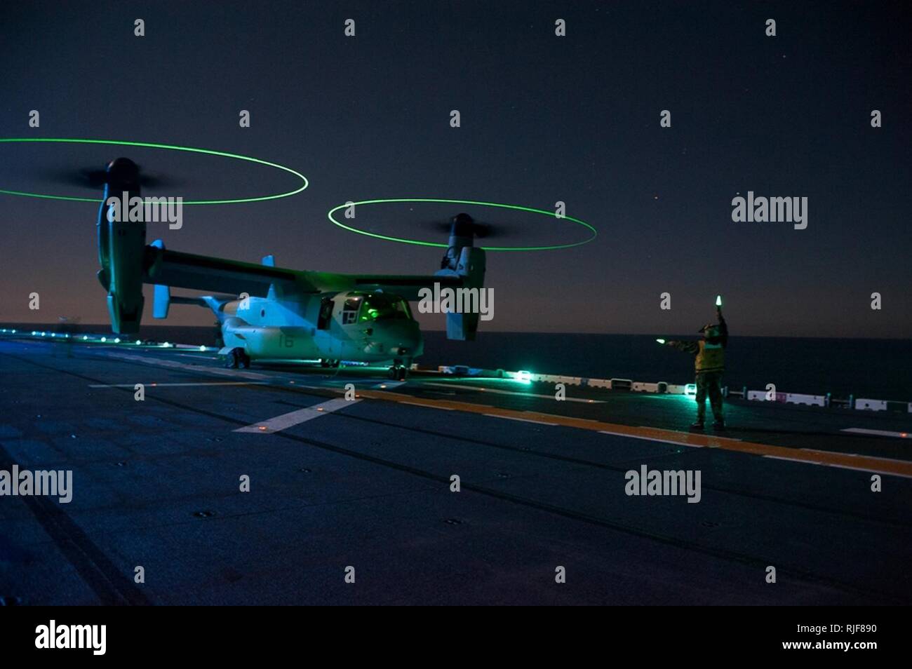 SAN DIEGO (Oct. 29, 2012) Flight deck personnel conduct night ...