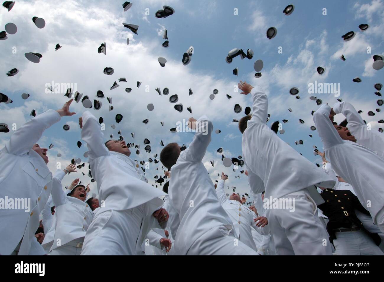 Annapolis, Md. (May 27, 2005) - Newly commissioned officers celebrate ...