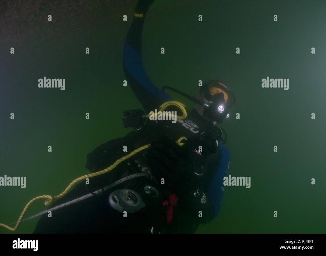 Navy Diver 2nd Class Ryan Smith, assigned to Mobile Diving and Salvage ...