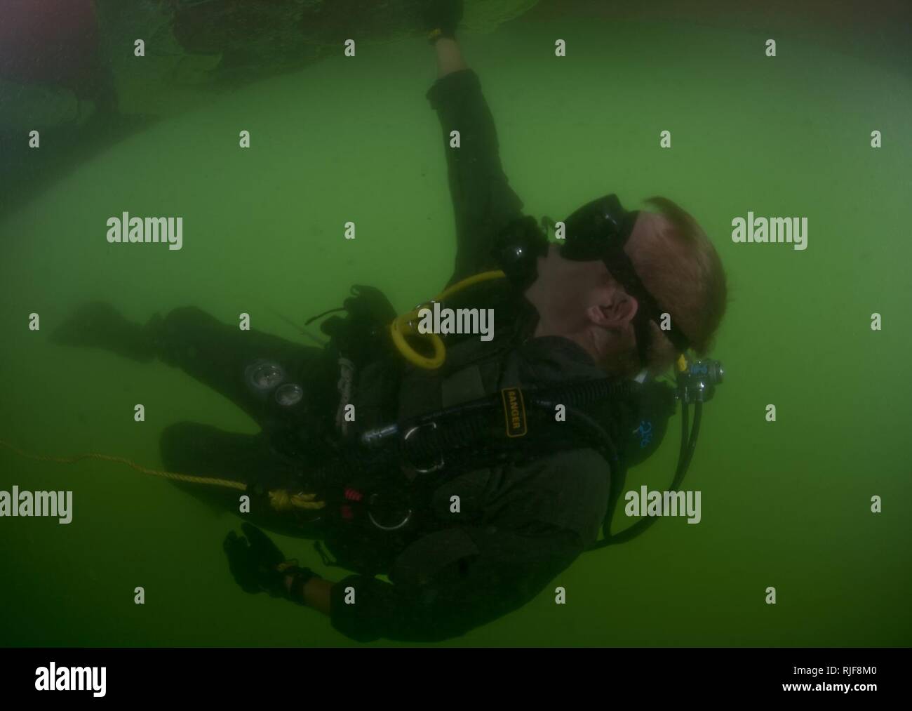 Navy Diver 2nd Class Ryan Smith, assigned to Mobile Diving and Salvage ...