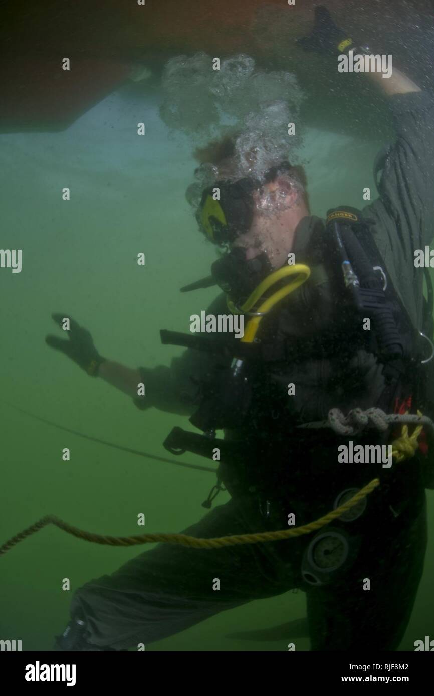 Navy Diver 2nd Class Ryan Smith, assigned to Mobile Diving and Salvage ...