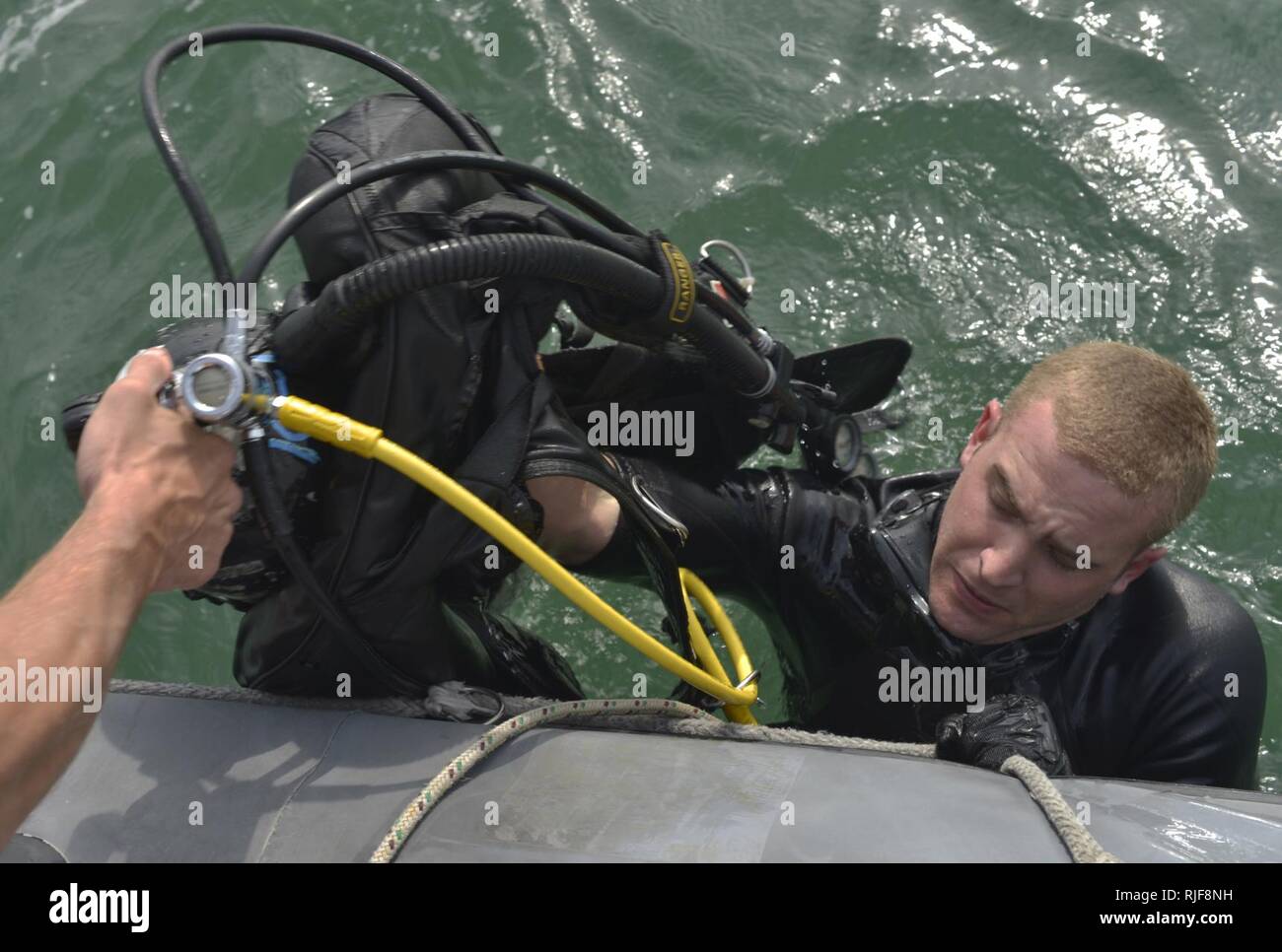 MINA SALMAN PIER, Bahrain (Jan. 9, 2013) Navy Diver 3rd Class Jacob ...