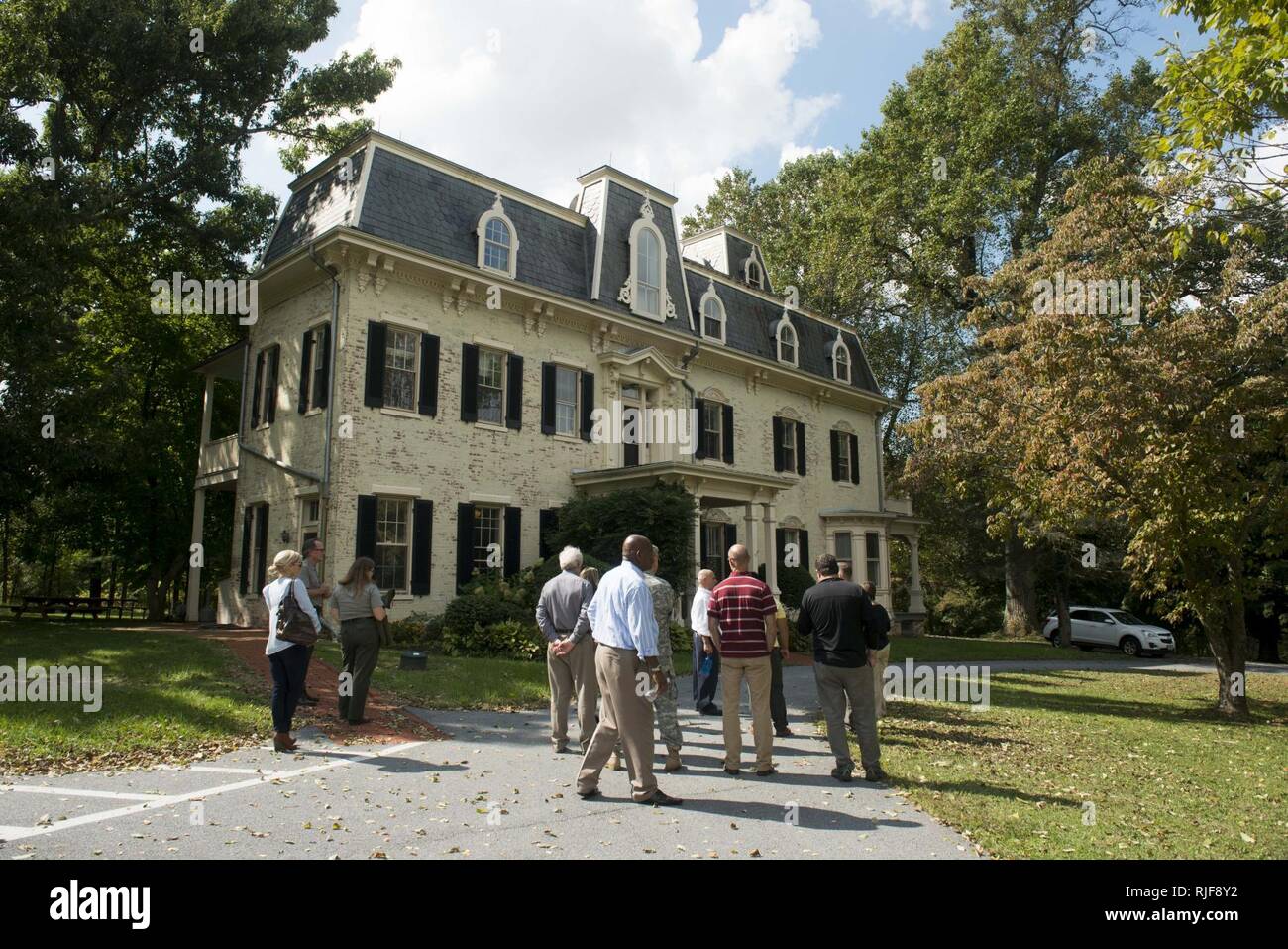 Arlington National Cemetery employees receive a tour the Gambrill House ...