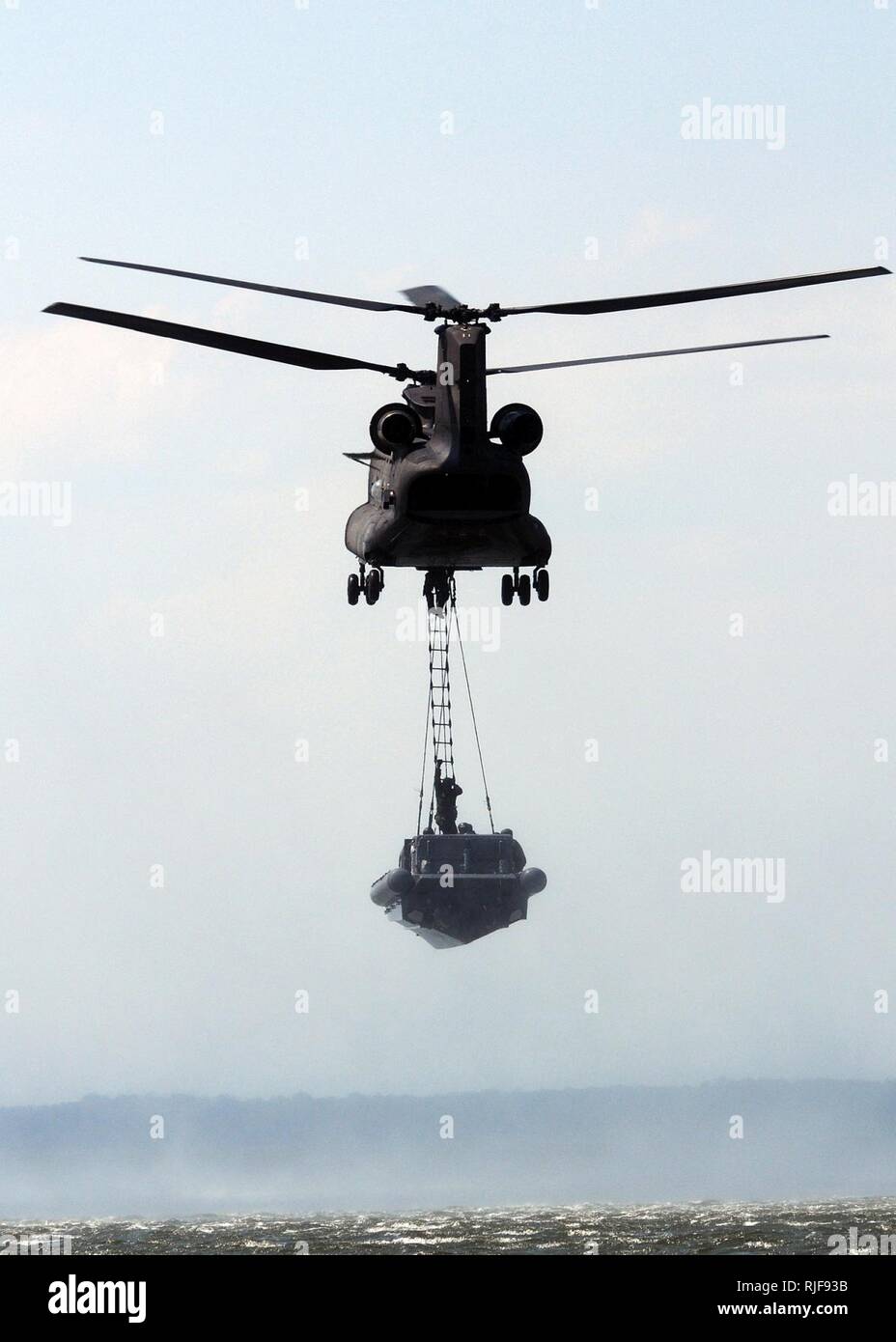 An Army CH-47 helicopter attached to the 159th Aviation Regiment lifts ...