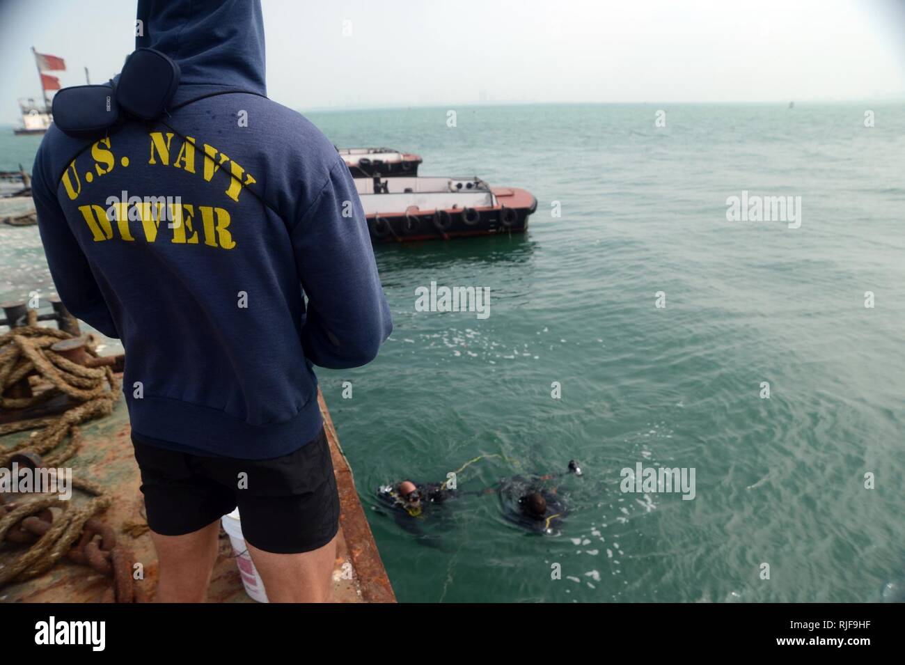 Navy Diver 2nd Class Camden Lund, assigned to Mobile Diving and Salvage ...