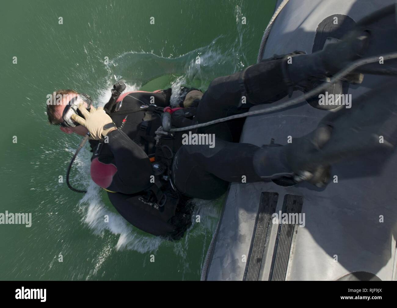 MINA SALMAN PIER, Bahrain (Jan. 2, 2013) Navy Diver 2nd Class Camden ...