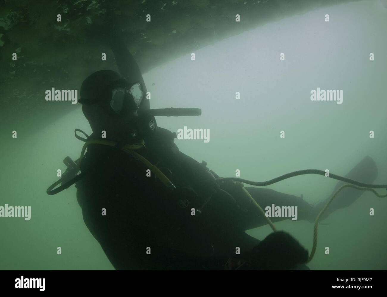 MINA SALMAN PIER, Bahrain (Feb. 13, 2013) Navy Diver 1st Class Ben Cohn ...