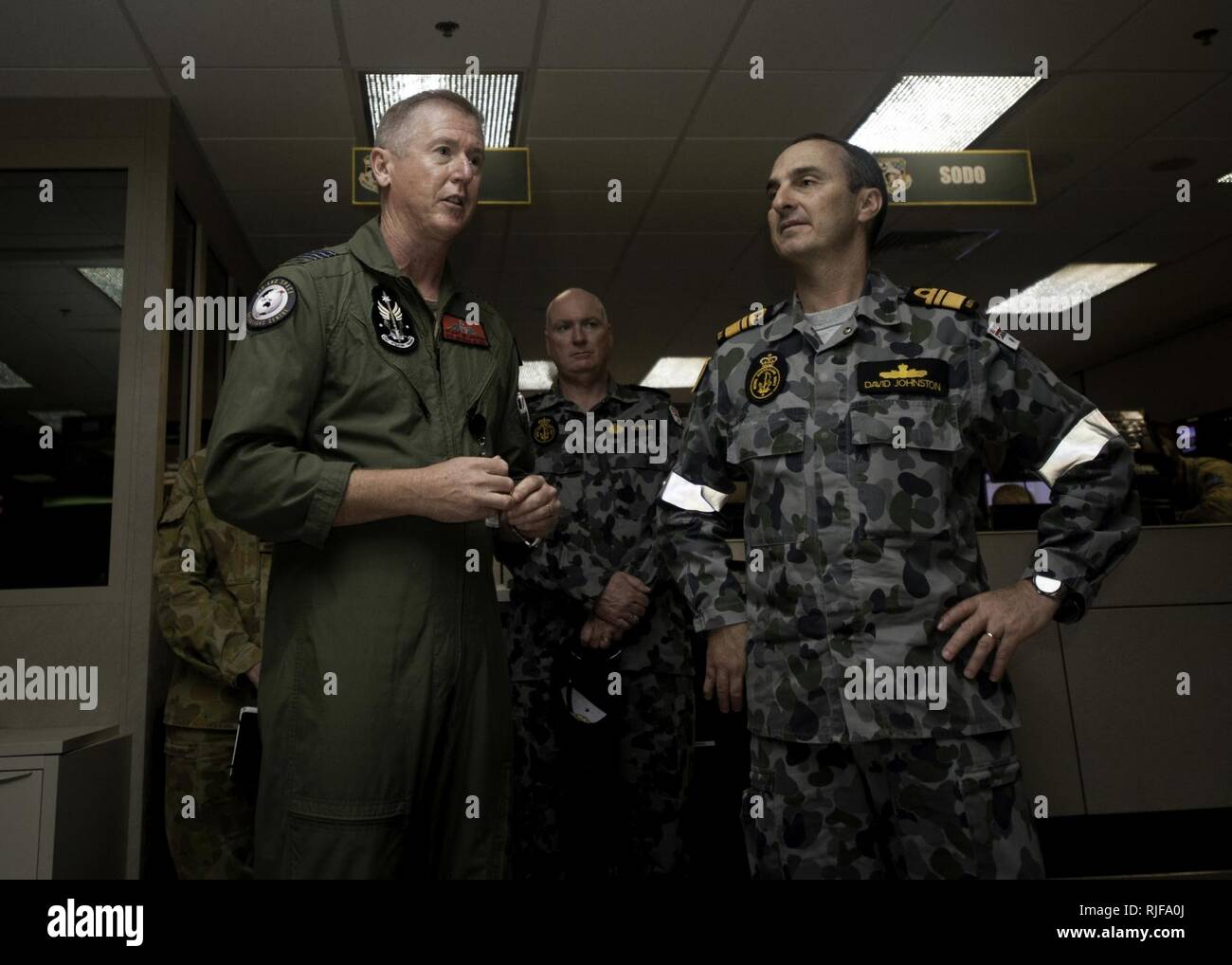 Group Captain Stuart Bellingham (left) gives Australian Chief of Joint ...