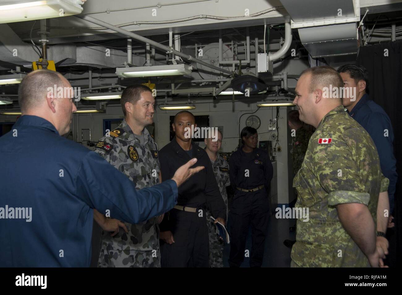 Chief Hospital Corpsman Curtis Stoughton introduces the medical team to ...