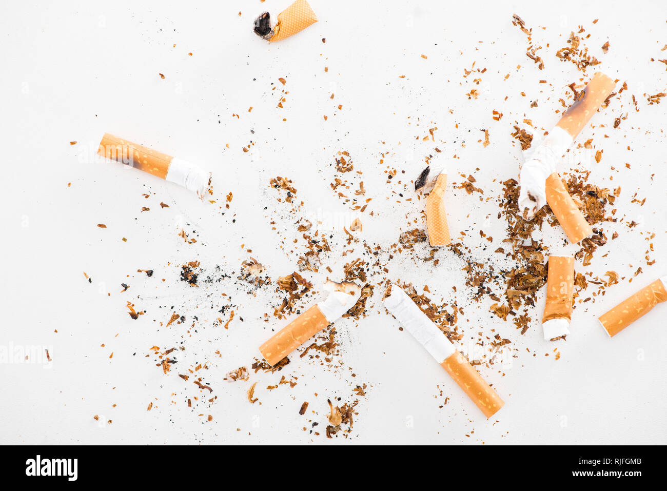 Top view of broken cigarettes isolated on white, stop smoking concept ...