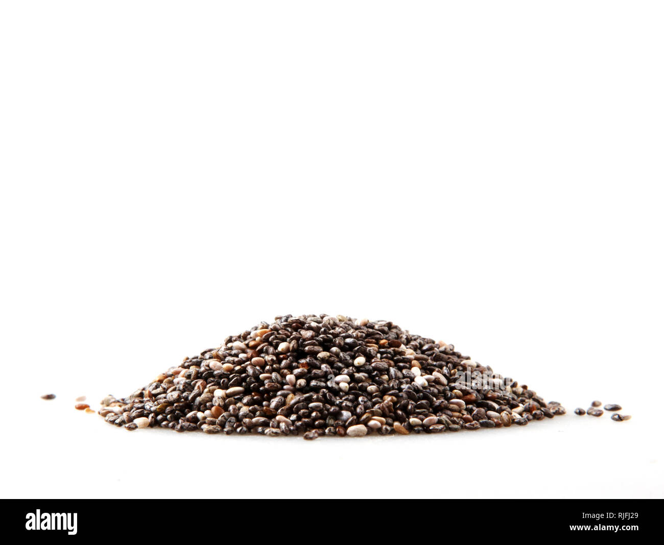 Pile Of Chia Seeds On White Background Stock Photo - Alamy