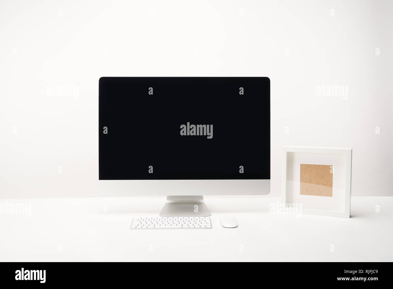 Desk computer photo frame hi-res stock photography and images - Alamy
