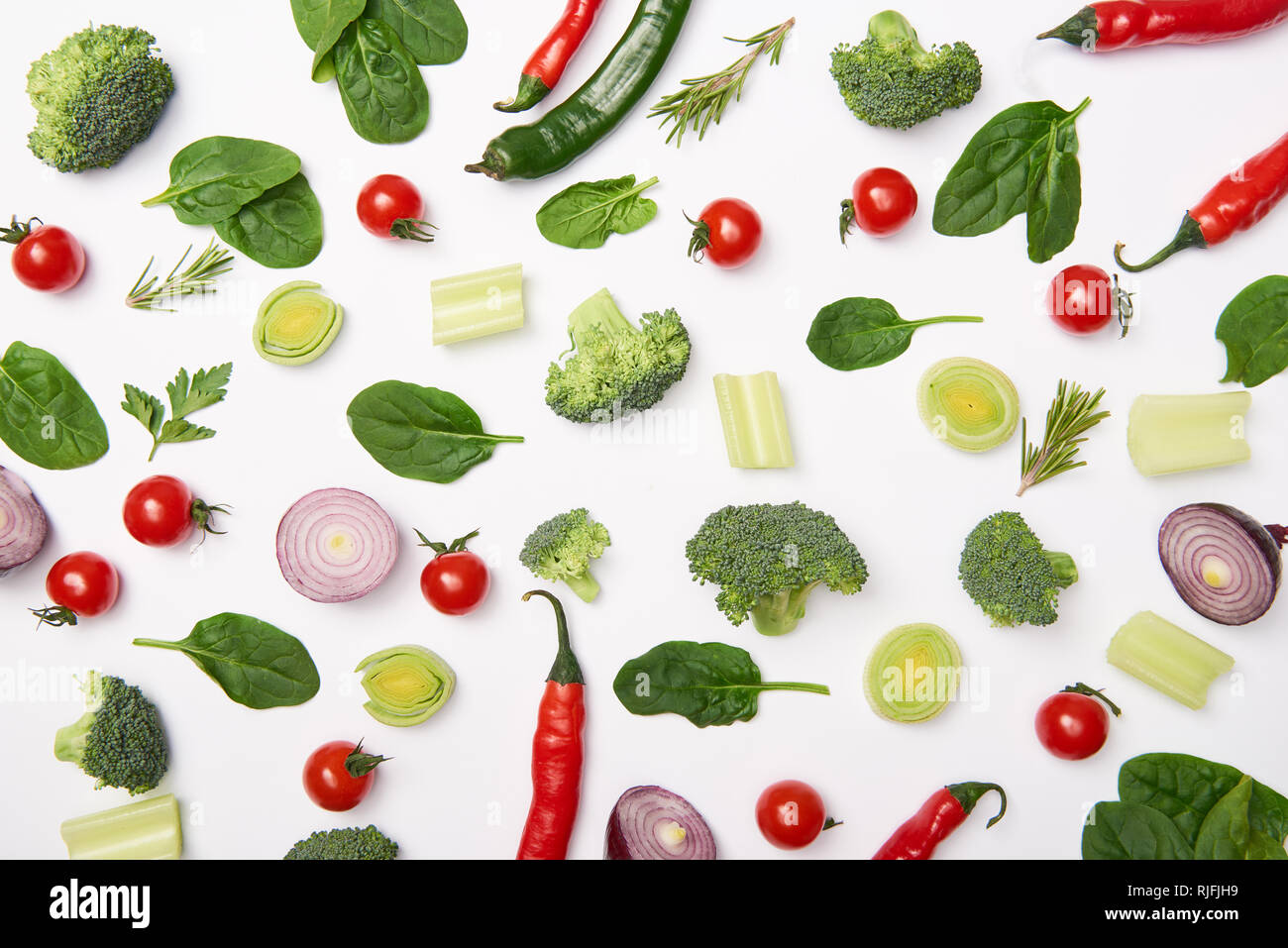 Flat lay with organic vegetables on white background Stock Photo - Alamy