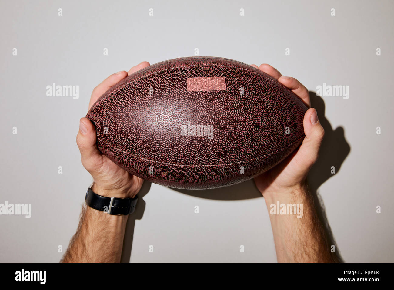 Both hands on ball hi-res stock photography and images - Alamy
