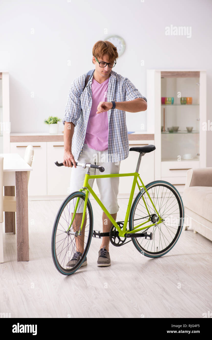 Student commuting to university using cycle Stock Photo - Alamy