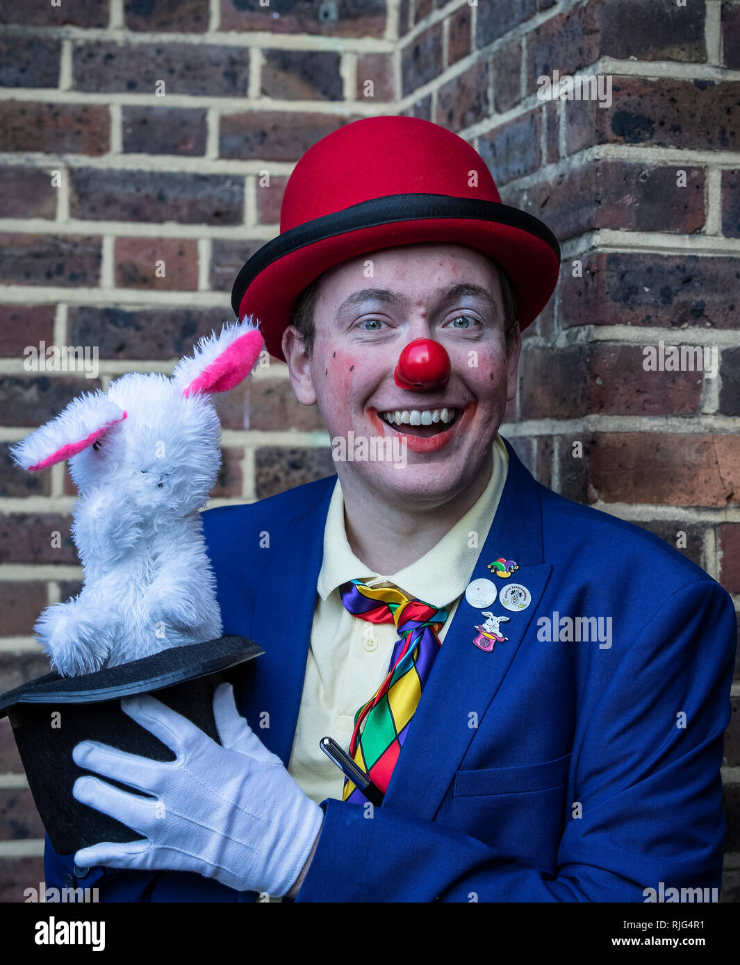Clown with Rabbit in Hat Stock Photo - Alamy