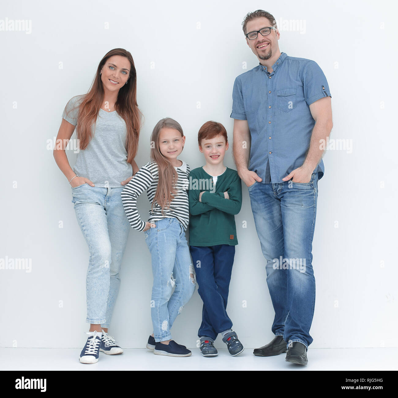in full growth.happy family with two children Stock Photo - Alamy