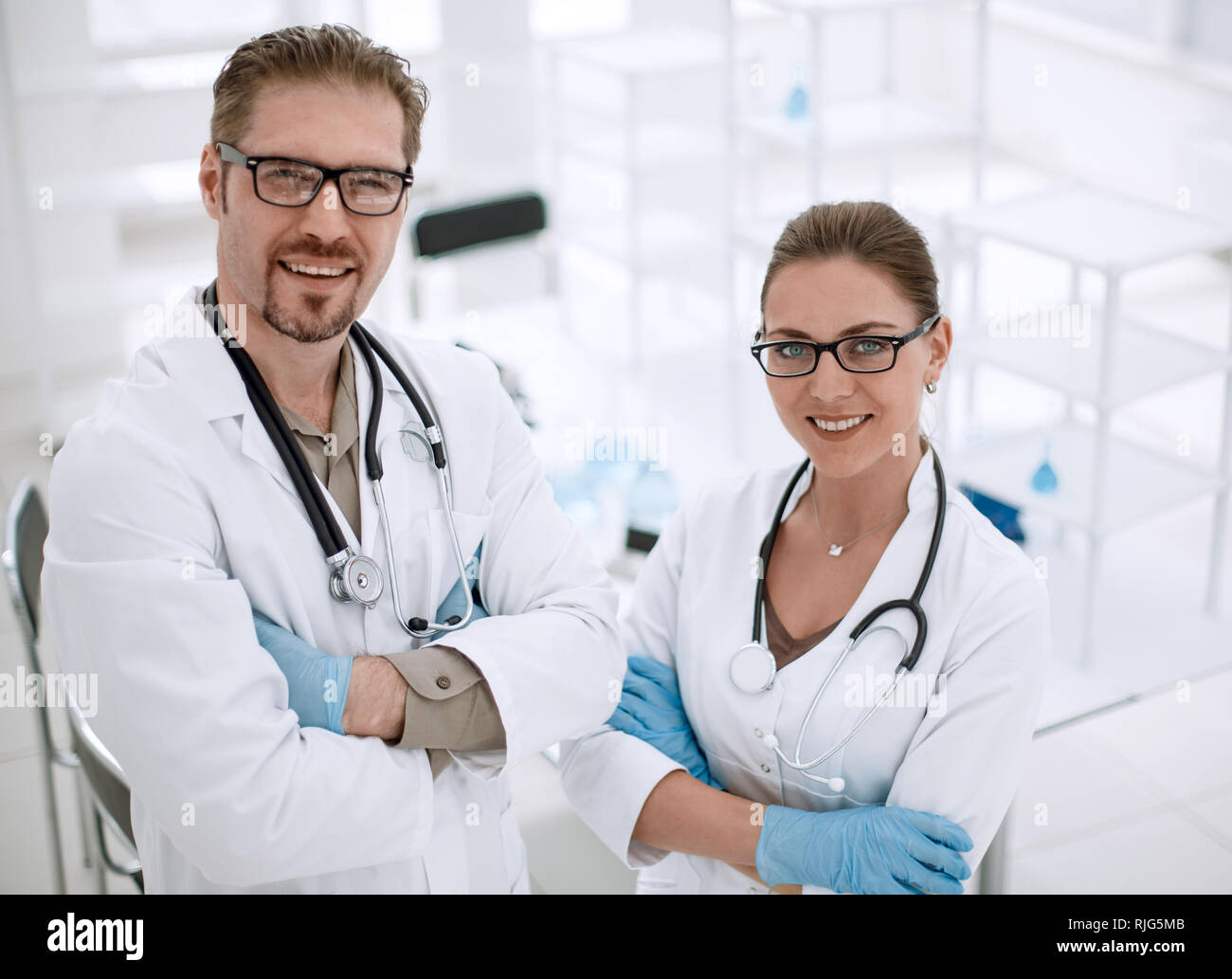two researchers on the background of the laboratory Stock Photo - Alamy
