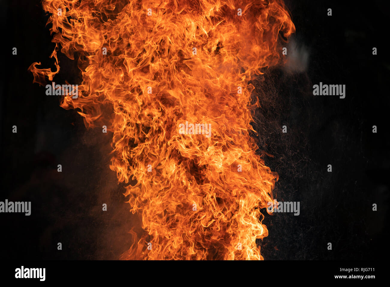 Closeup Fire flames from gas explosion on black background Stock Photo ...