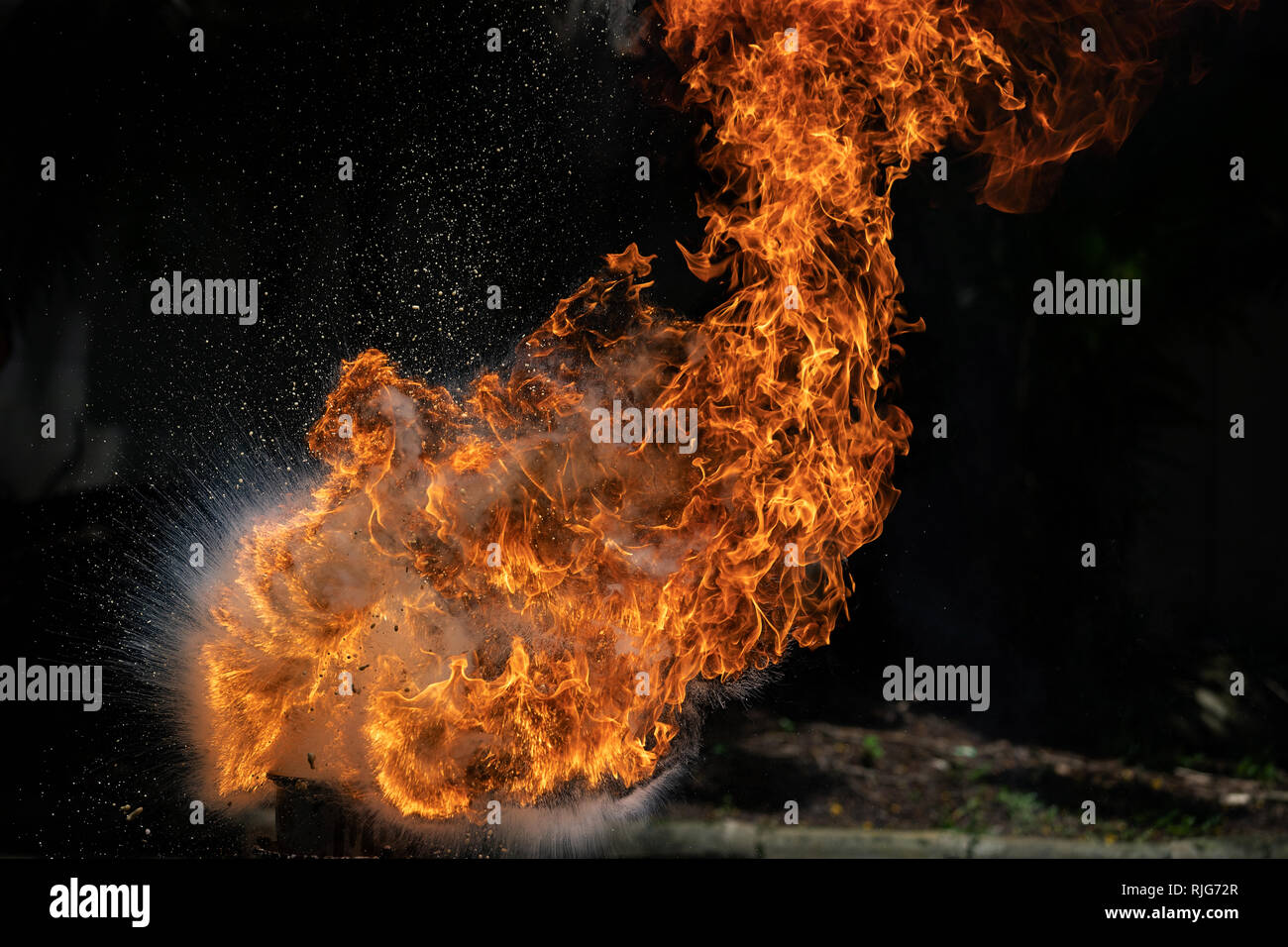 Closeup Fire flames from gas explosion on black background Stock Photo ...