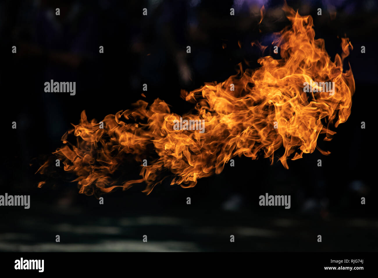 Closeup Fire flames from gas explosion on black background Stock Photo ...