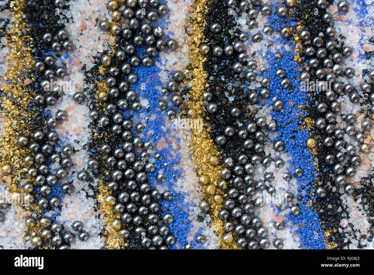 Layered colorful sand pattern. Marble style background. Blue and gold ...