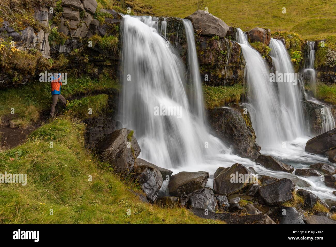 Tourist photographs waterfall Gluggafoss, also Merkjárfoss, South ...