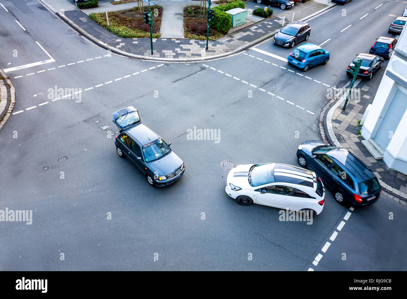 Aerial view of car accident on road crossing Stock Photo - Alamy