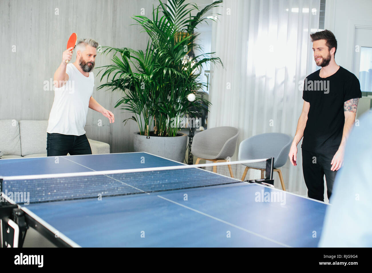 People playing table tennis Stock Photo - Alamy