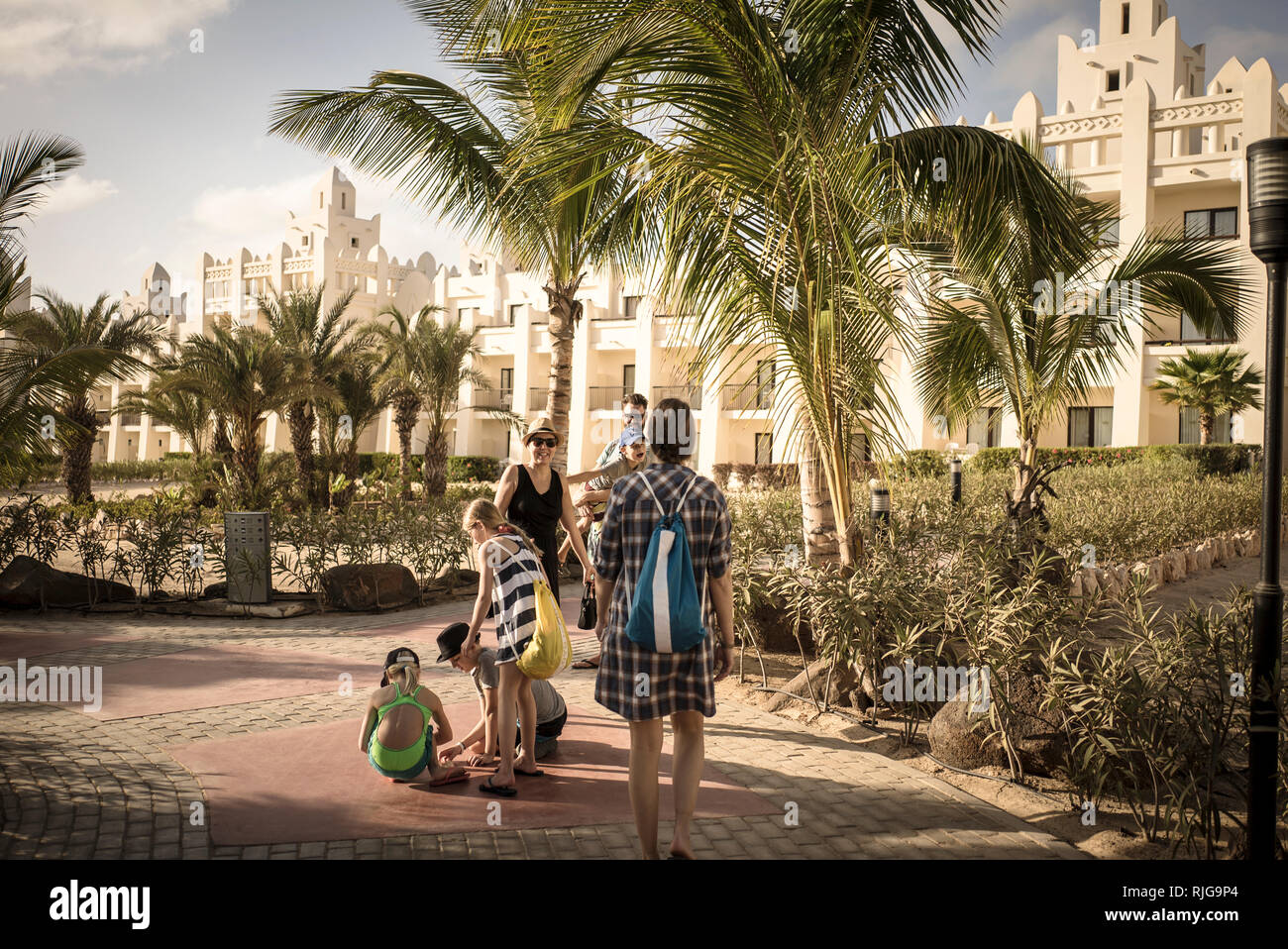 Family in tourist resort Stock Photo - Alamy