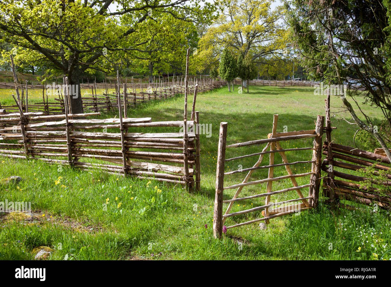 Open wooden gate Stock Photo - Alamy