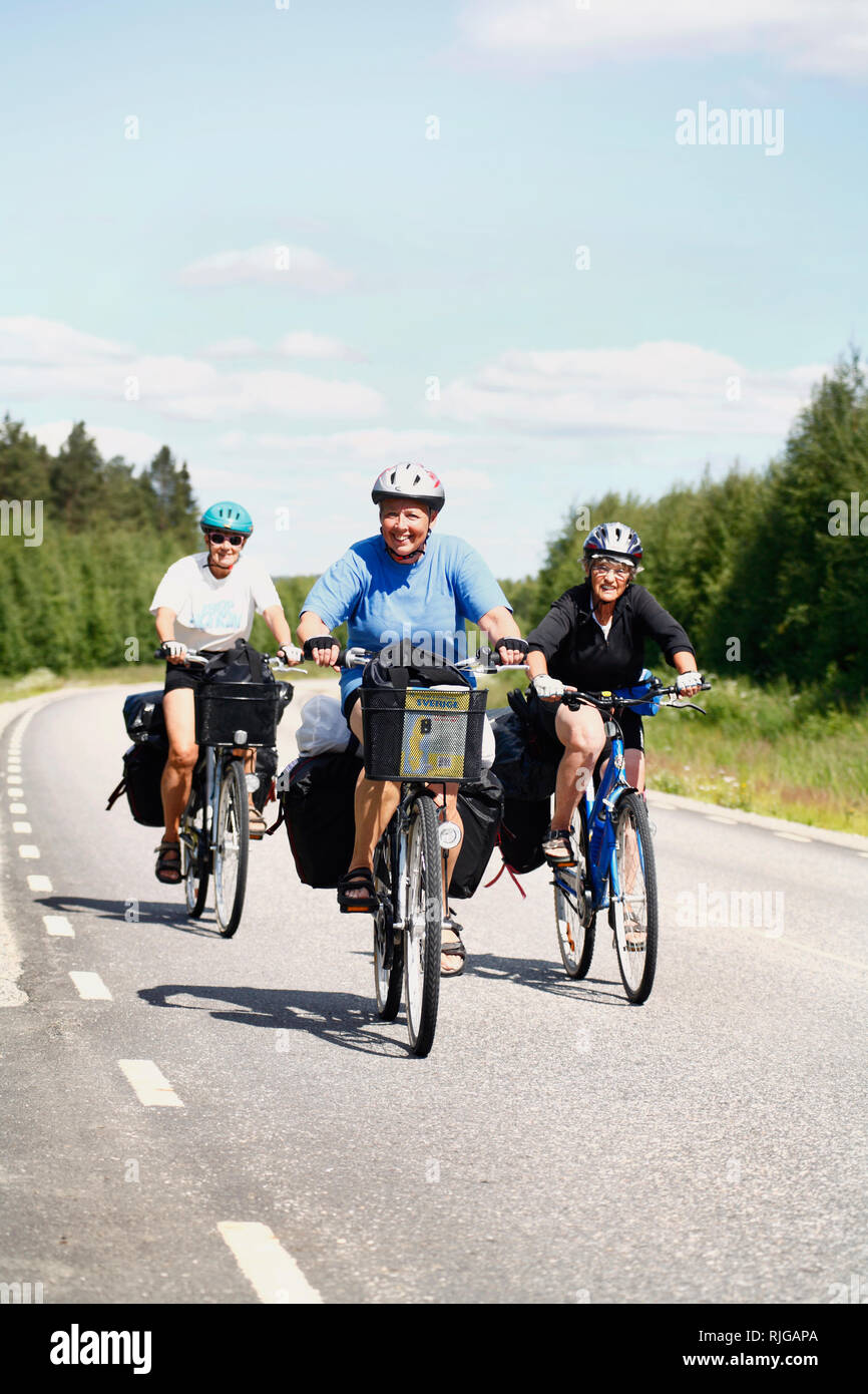 Three women on cycling holiday hi-res stock photography and images - Alamy