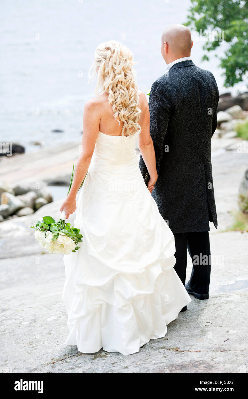 Couple standing view rear dress hi-res stock photography and images - Alamy
