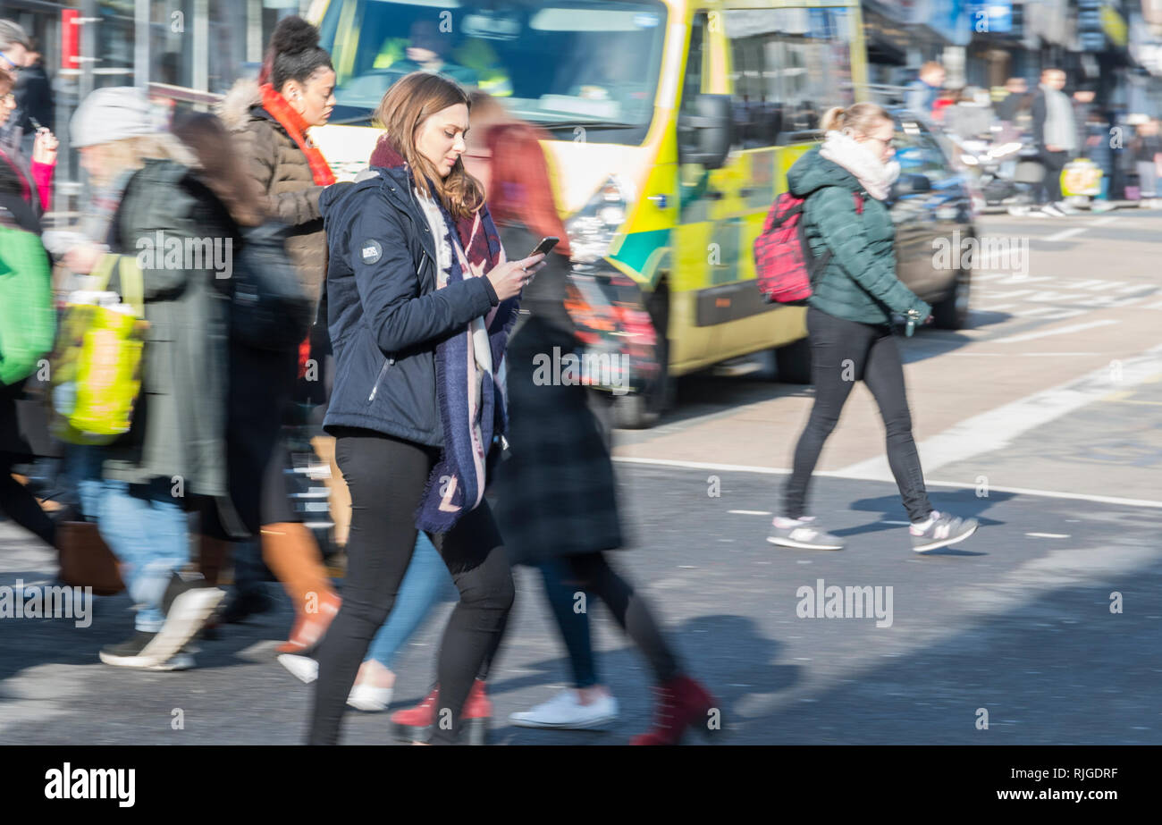 Mobile phone crossing road hi-res stock photography and images - Alamy