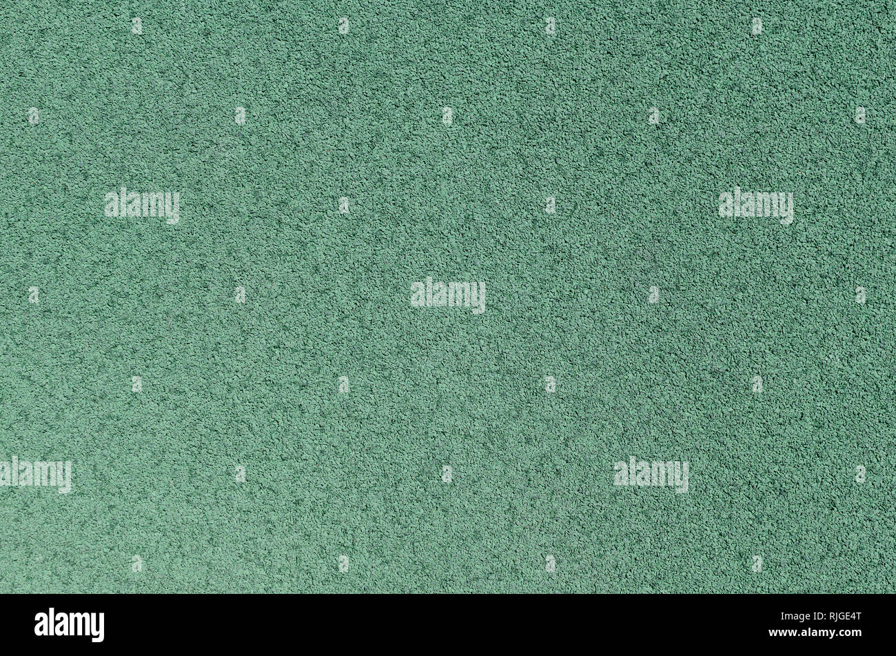 Green rubber covering for sports and playgrounds. Texture Stock Photo ...