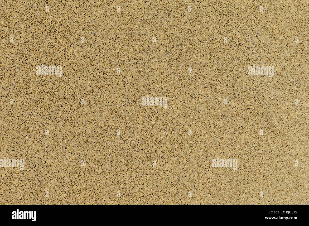 Yellow rubber covering for sports and playgrounds. Texture Stock Photo ...