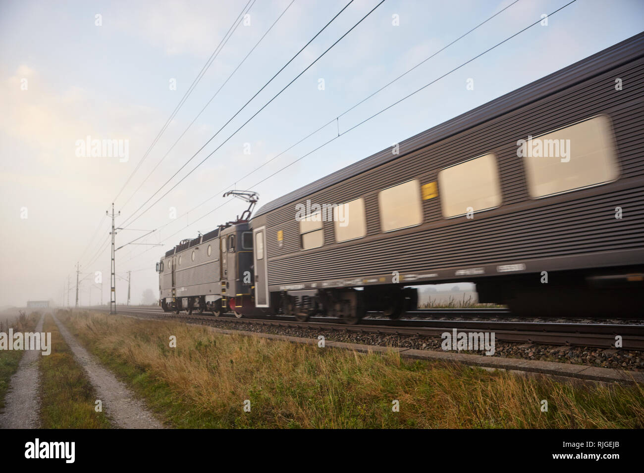 Train on tracks Stock Photo - Alamy