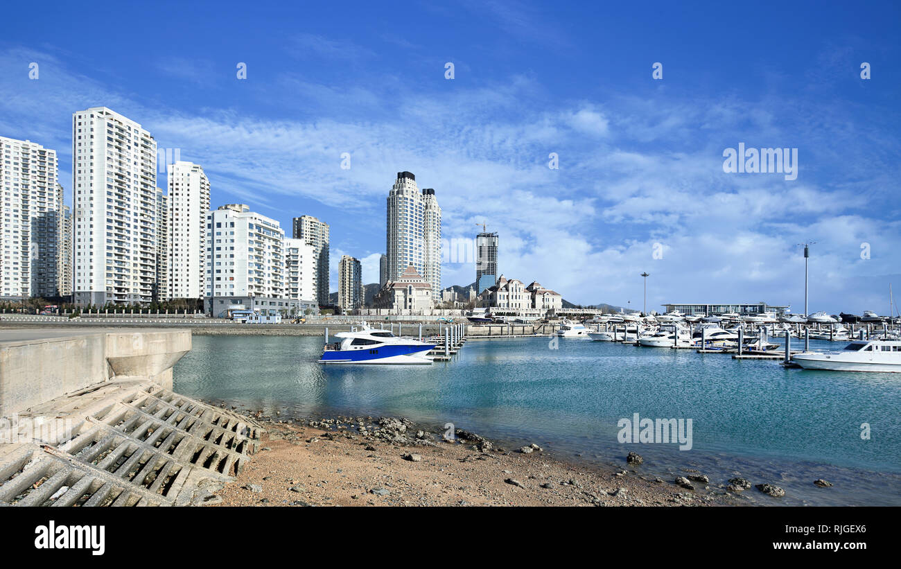 Modern apartments an yacht harbor in Dalian, one of the most livable ...