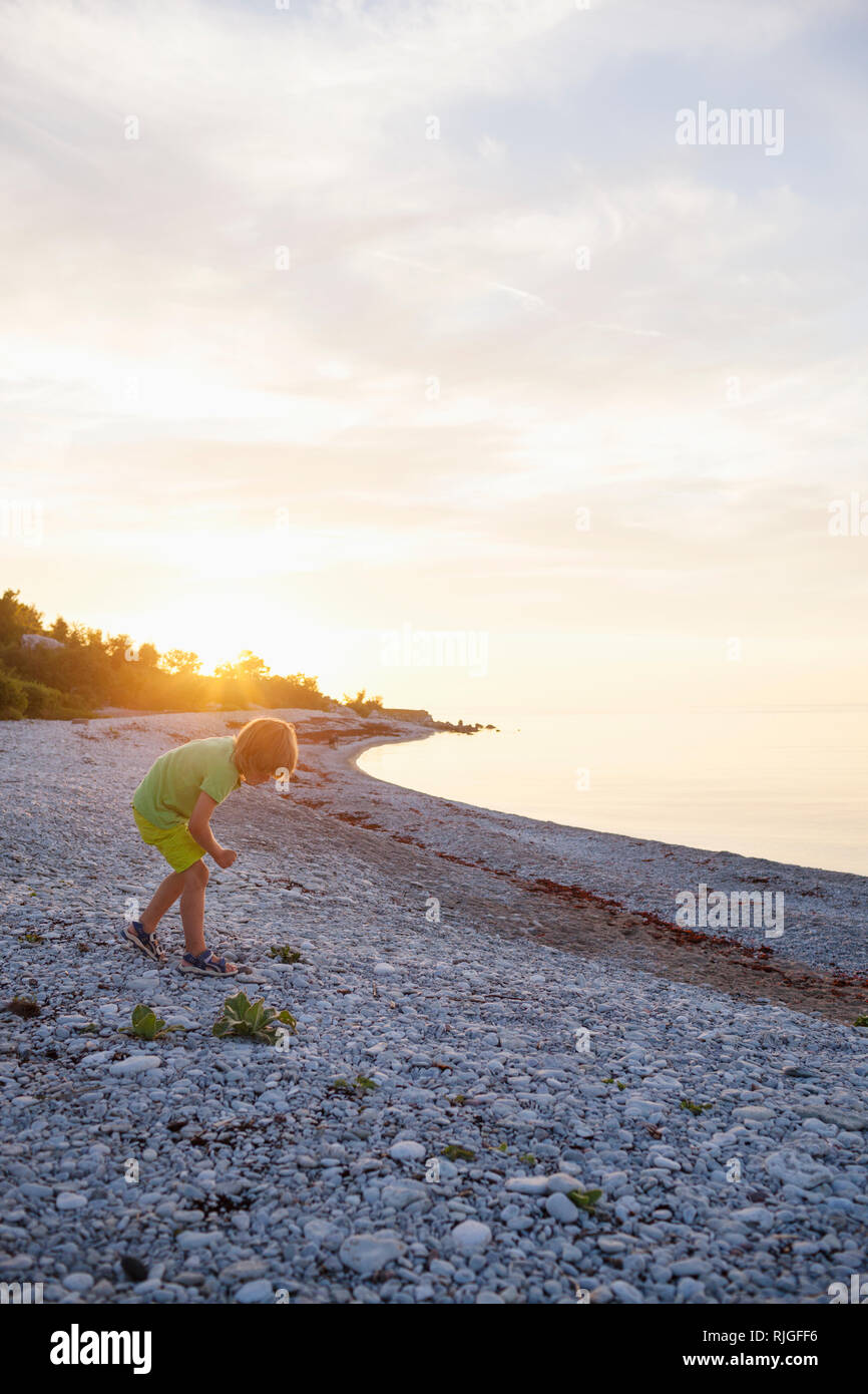 Child on beach Stock Photo - Alamy
