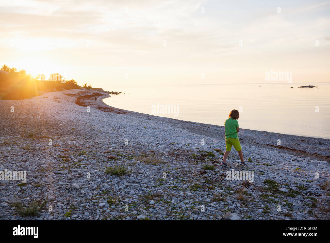 Child on beach Stock Photo - Alamy