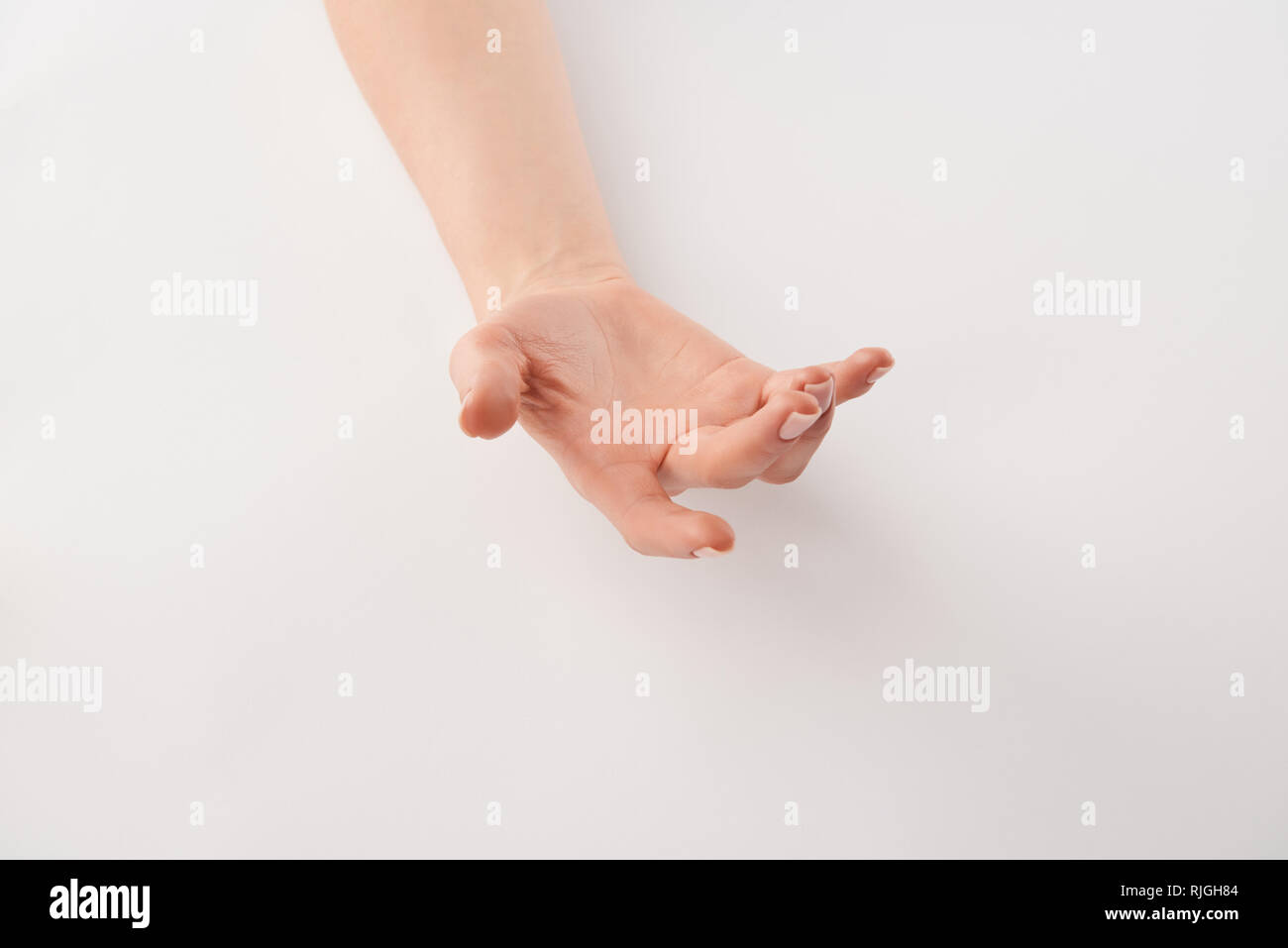 Partial view of female well-cared open hand on white background Stock ...