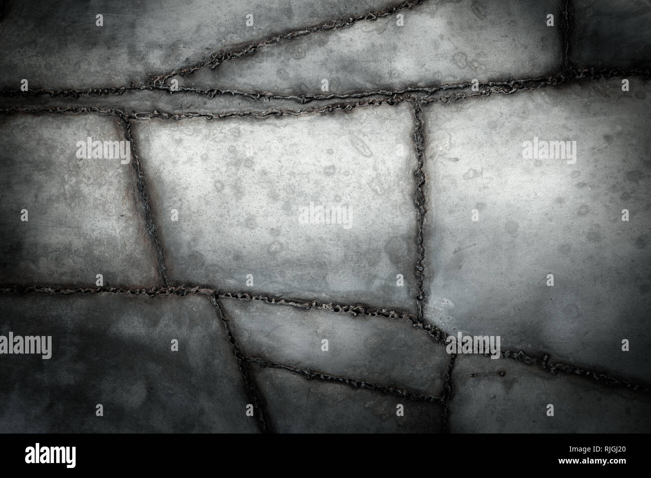 Rough welded metal texture background Stock Photo - Alamy