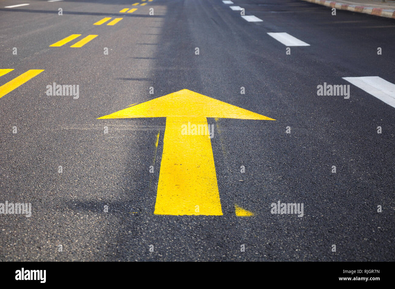 Direction Arrows On Asphalt High Resolution Stock Photography and ...