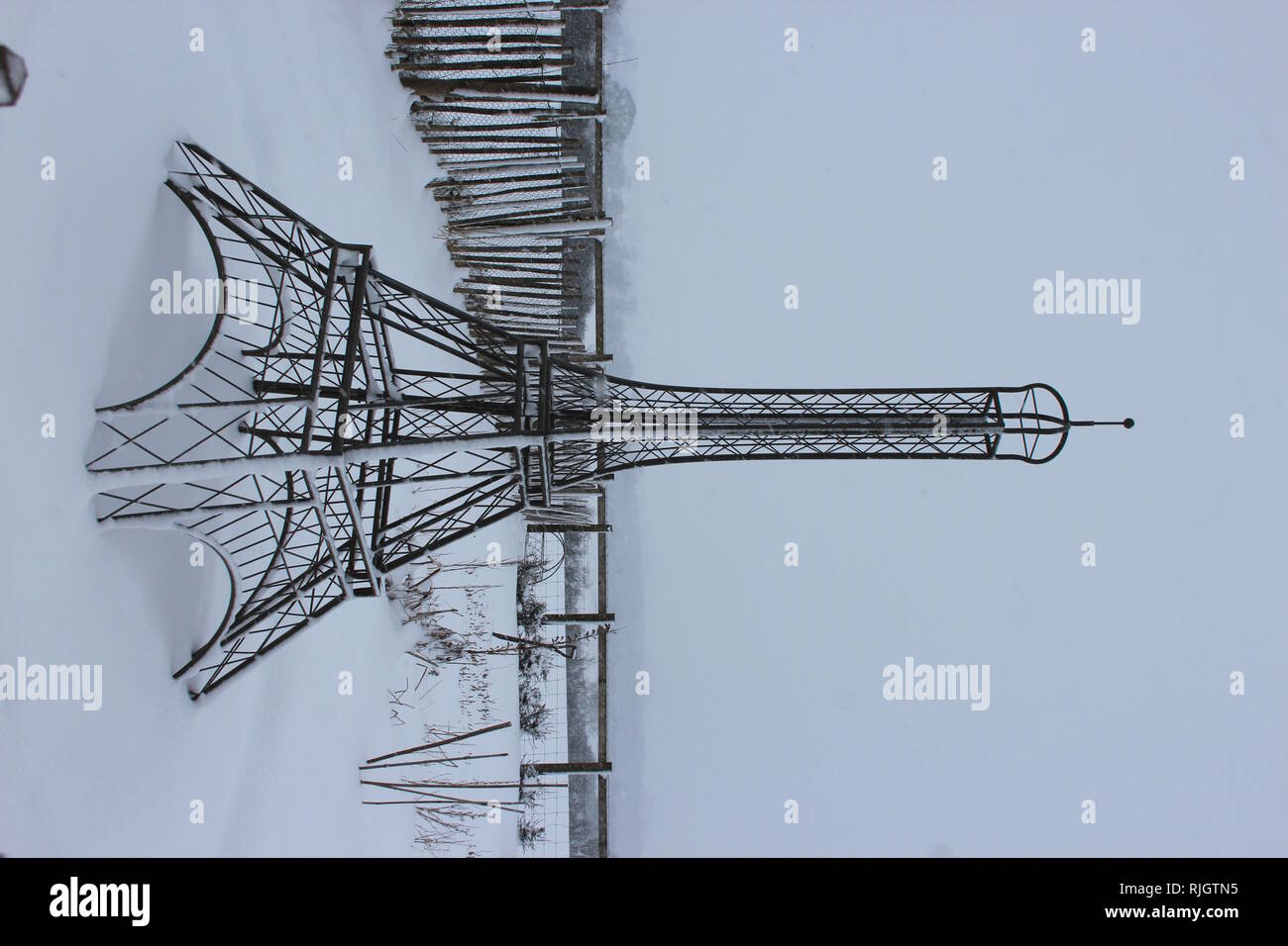 Garden Eifle Tower in the snow Stock Photo - Alamy