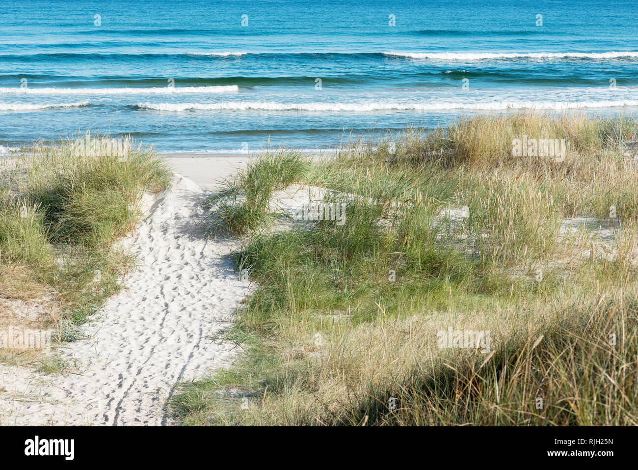 Sandy beach waves hi-res stock photography and images - Alamy