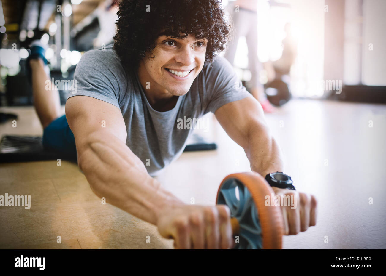 Handsome men exercising in gym hi-res stock photography and images - Alamy