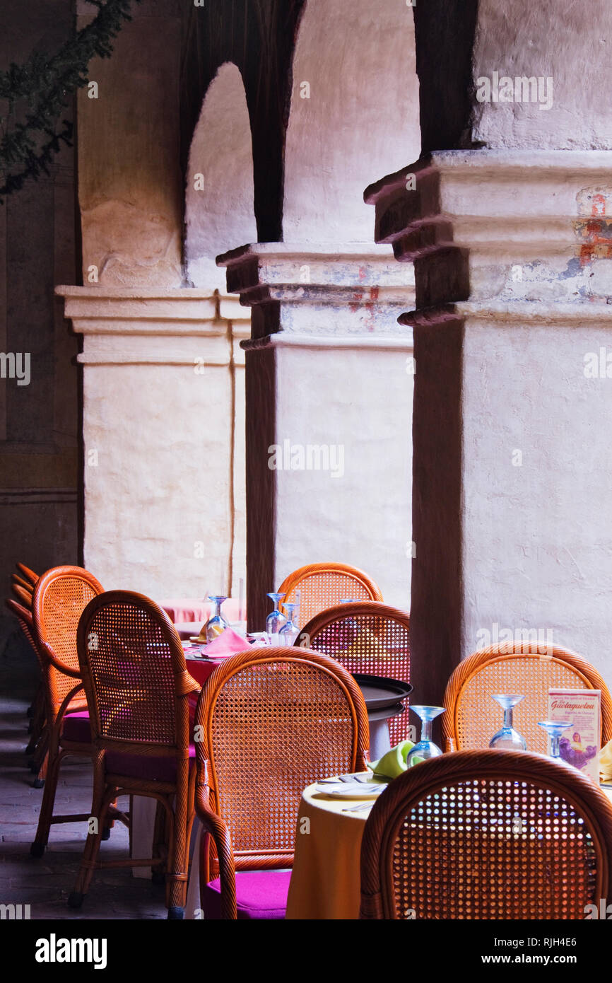 Restaurant Seating Amidst Columns Stock Photo - Alamy