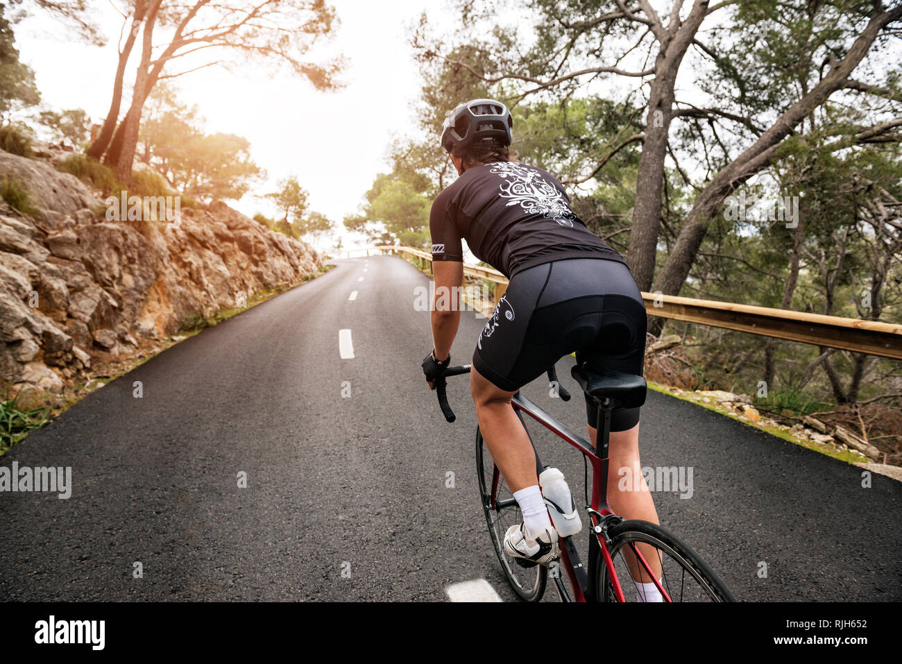 Woman road cyclist hi-res stock photography and images - Alamy