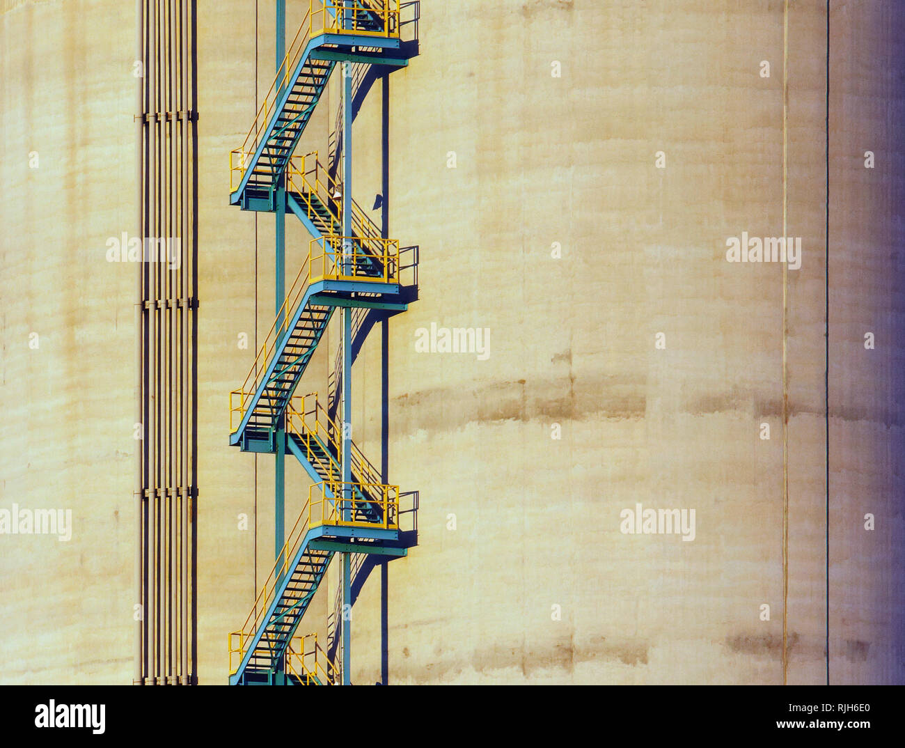 Ladder On Side of Building Stock Photo - Alamy